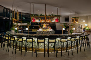 8 AT TRINITY. A Parisian Salon By The Lake Luring Diners. - COAST Magazine